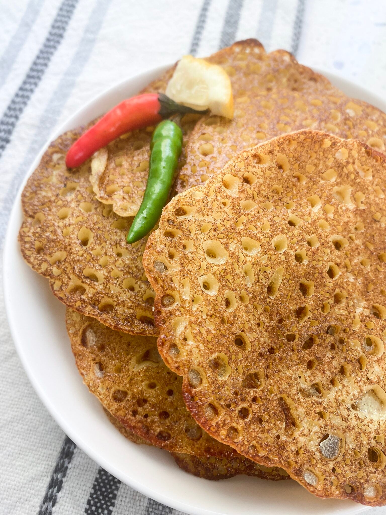 Khatta Poodla - Savory Rice Flour Pancakes | The Curry Mommy